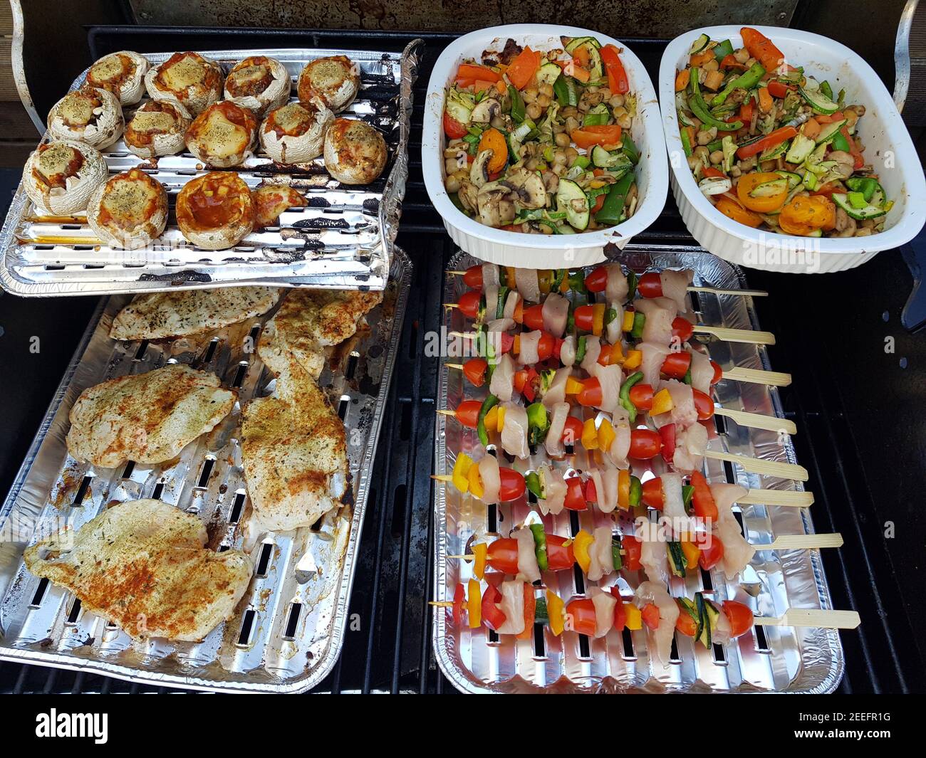 Grilled vegetables and meat on a barbecue grill , top view Stock Photo ...