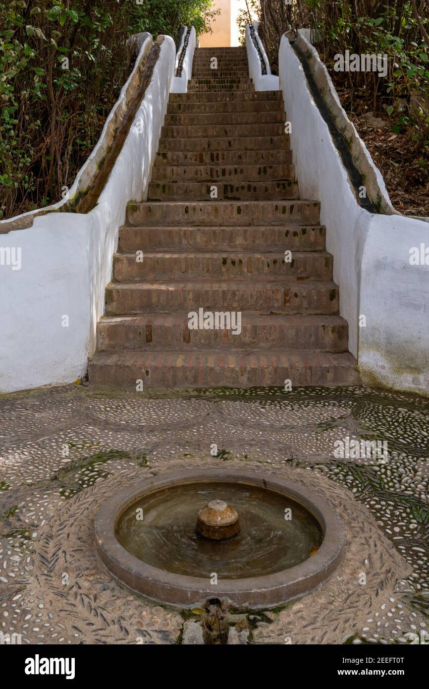 A view of the Escalera del Agua stairs in the Generalife Palace and ...