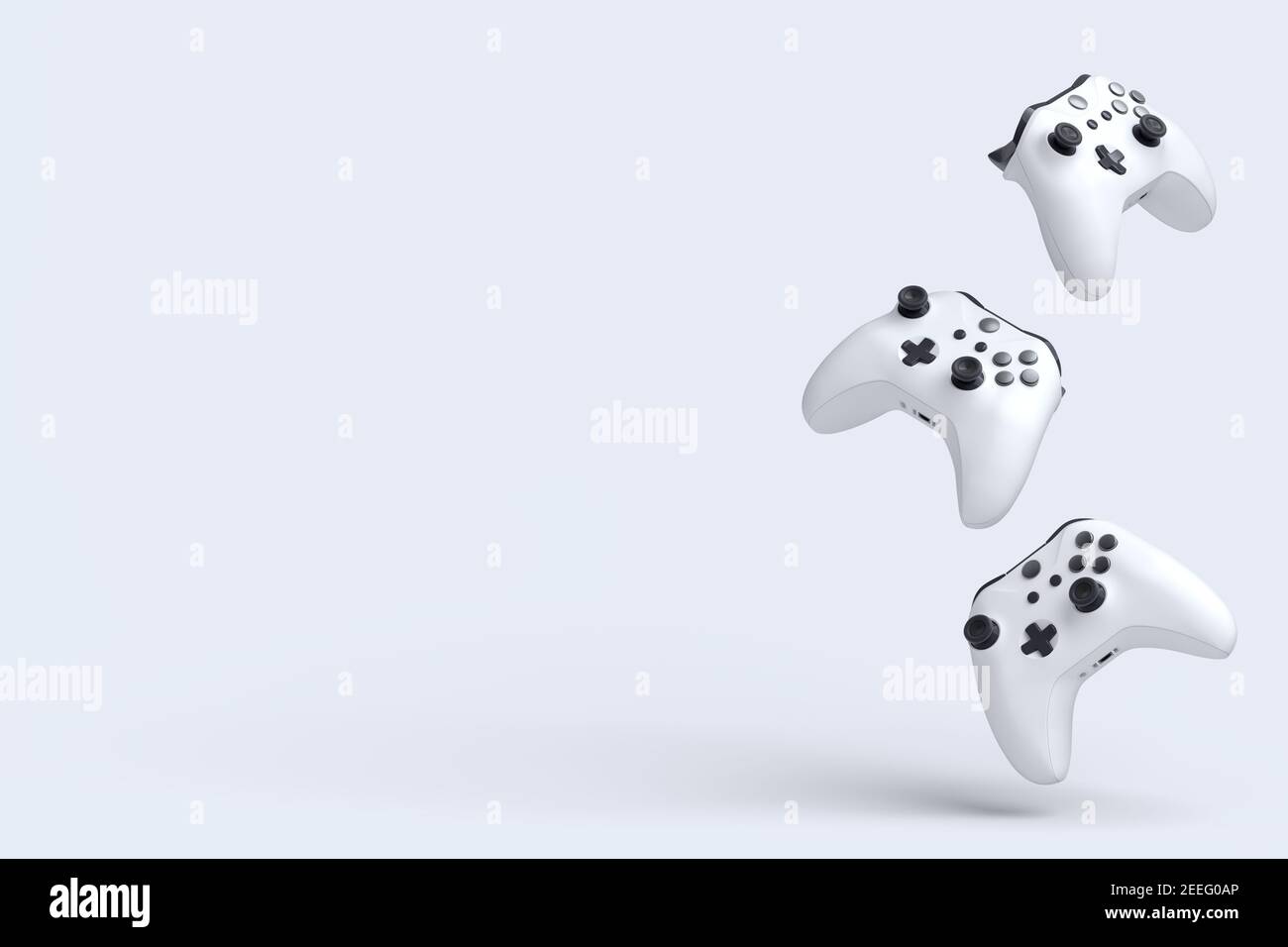 Flying gamer joysticks or gamepads on white background Stock Photo - Alamy