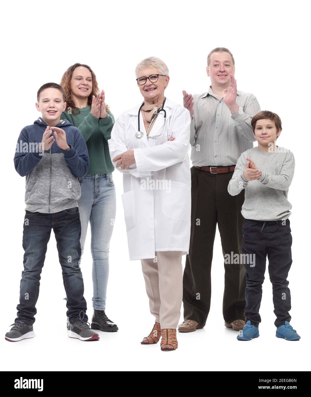 happy family and their family doctor standing together Stock Photo - Alamy