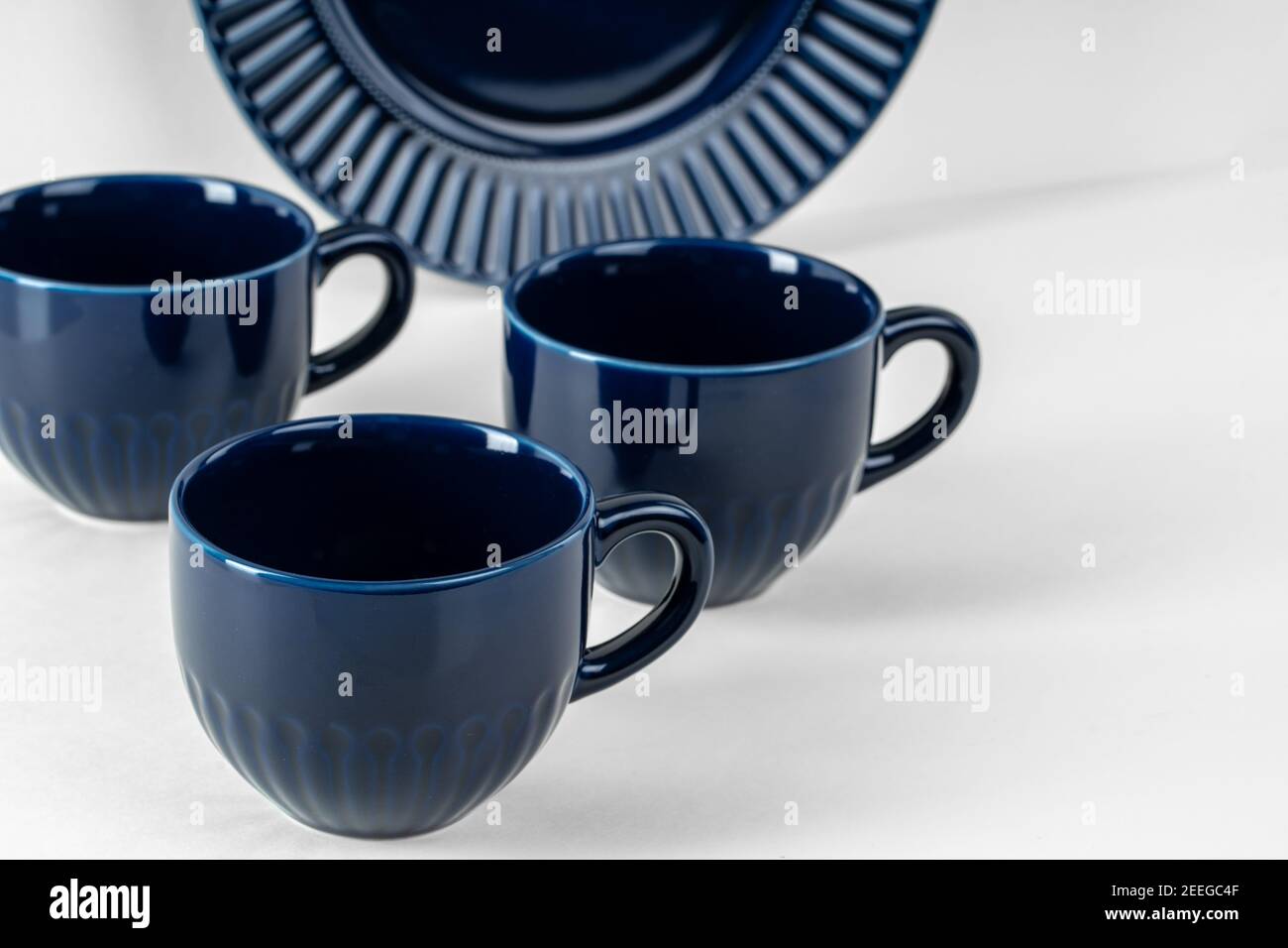 Simple ceramic blue crockery on kitchen counter Stock Photo - Alamy