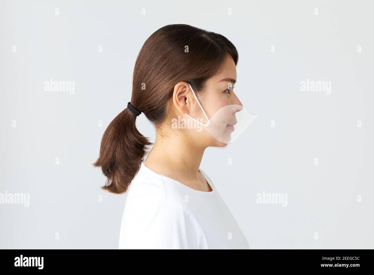 Japanese woman wearing face shield Stock Photo - Alamy