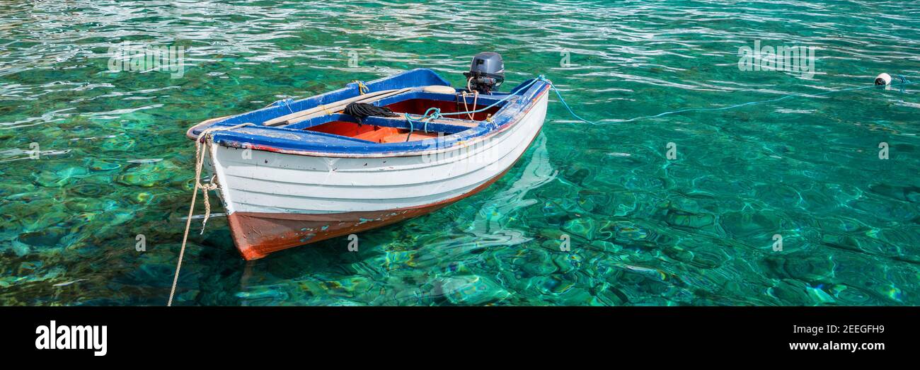 Ffishing boat on panoramic clear pristine water in Crete, Greece Stock ...