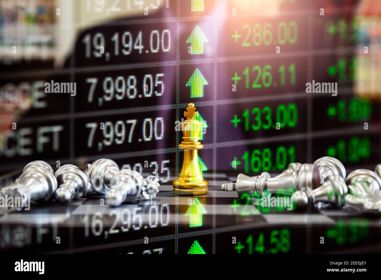 Chess game on chess board behind business man background. Business ...