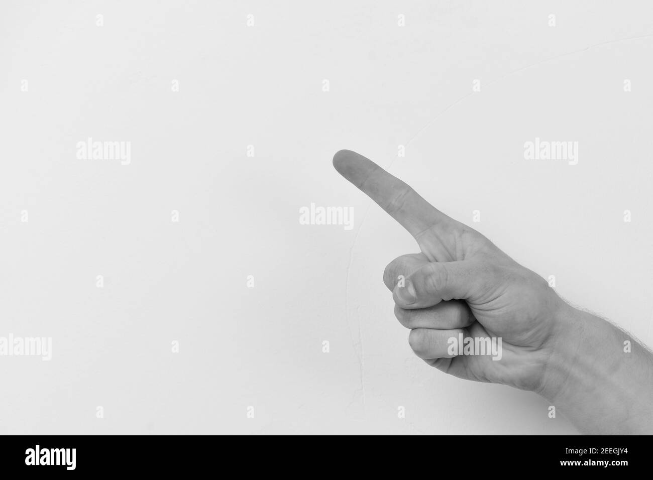 Male hand points up. Hand gesture shows direction. Hand isolated on ...