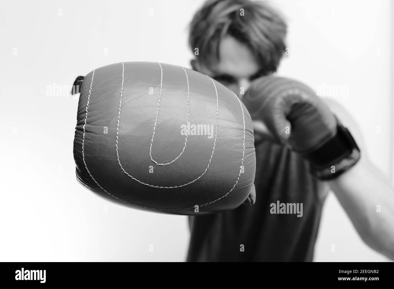 Championship and training concept. Athlete with leather box equipment ...