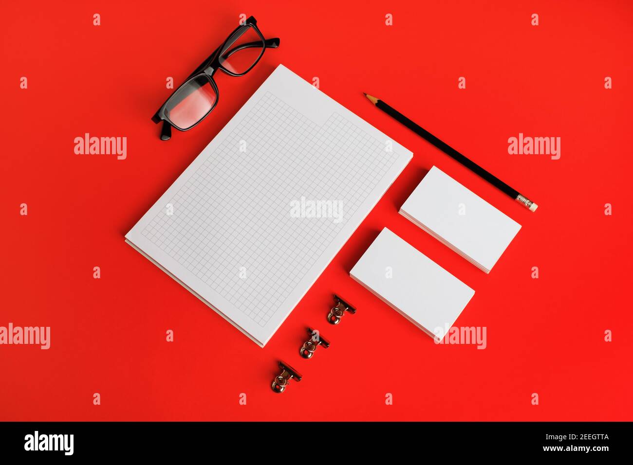 Photo of blank stationery set on red paper background. Corporate ...