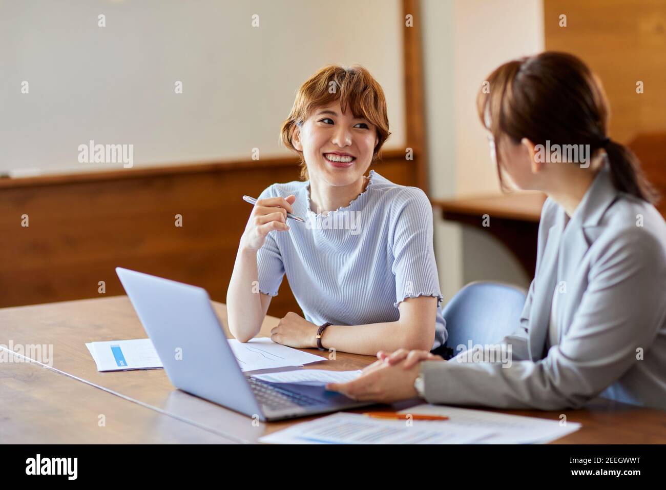 Young Japanese women working Stock Photo - Alamy