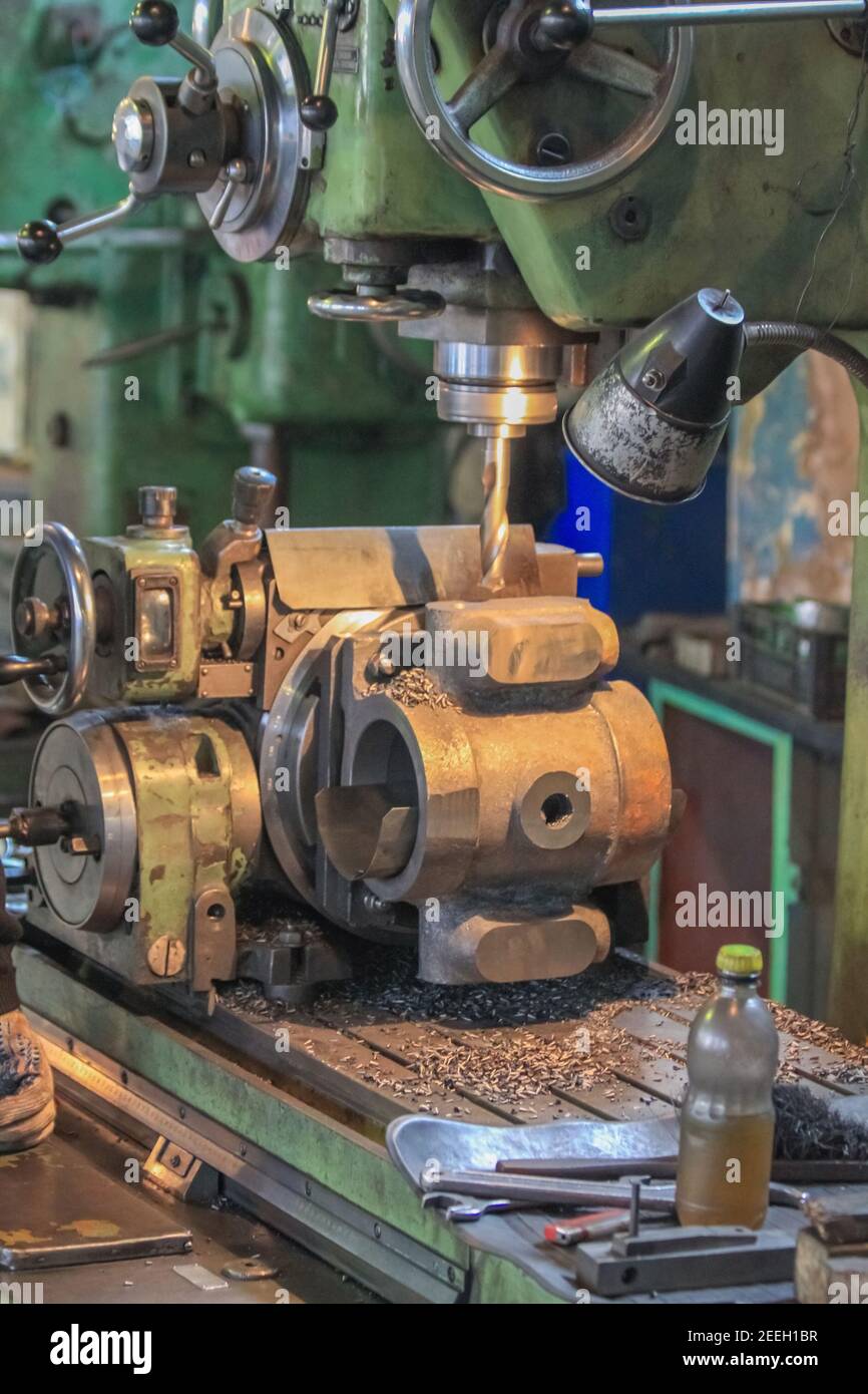Industrial drilling machine in operation Stock Photo - Alamy