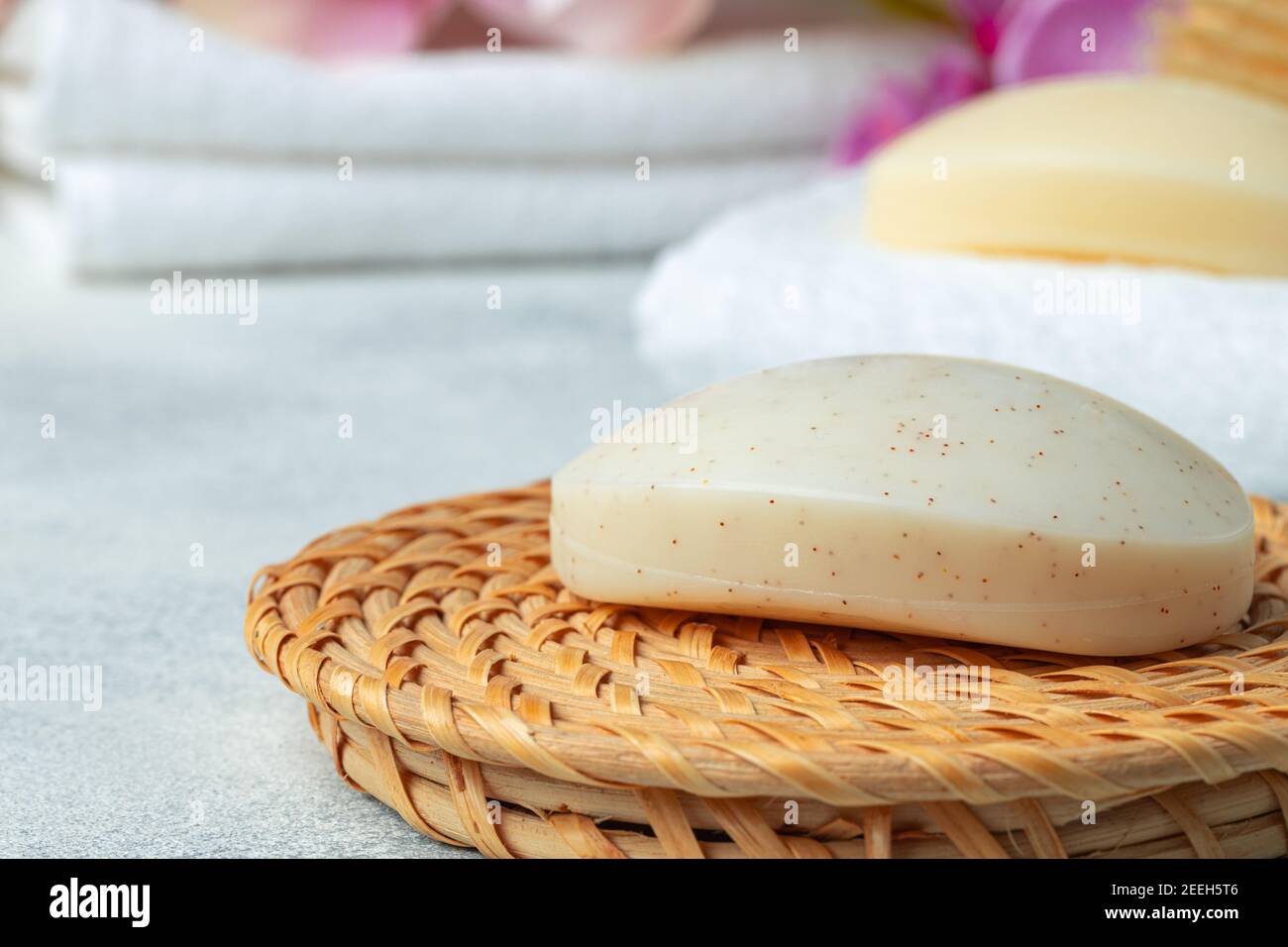 Bar of natural handmade soap, towel and spa objects Stock Photo - Alamy