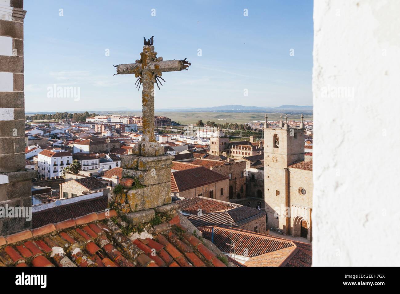 Mesmerizing view of a detail of an old and damaged cross in Caceres ...