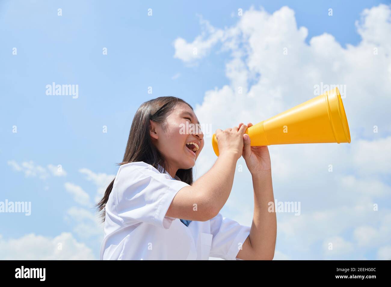 Cheering Japanese junior high schoolgirl Stock Photo - Alamy
