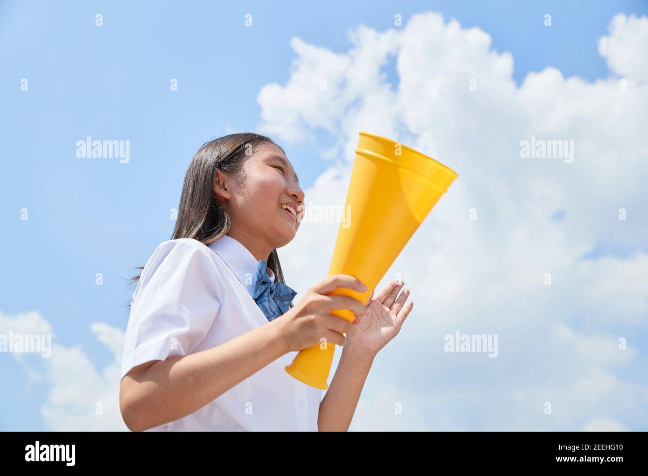 Cheering Japanese junior high schoolgirl Stock Photo - Alamy