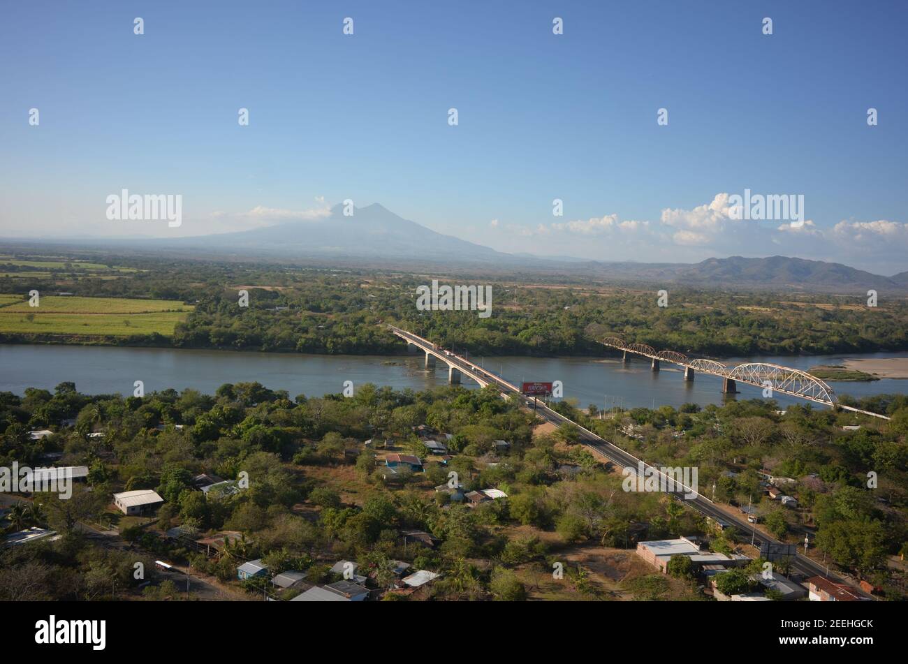 Panoramic view of a long bridge over a wide river Stock Photo - Alamy