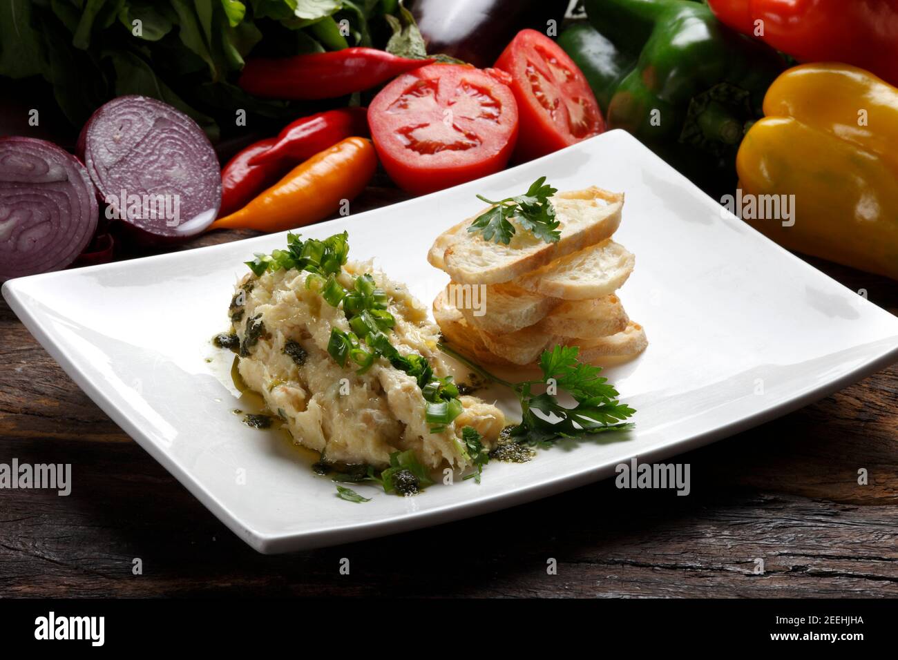 Cod shredded with ciabatta Stock Photo - Alamy