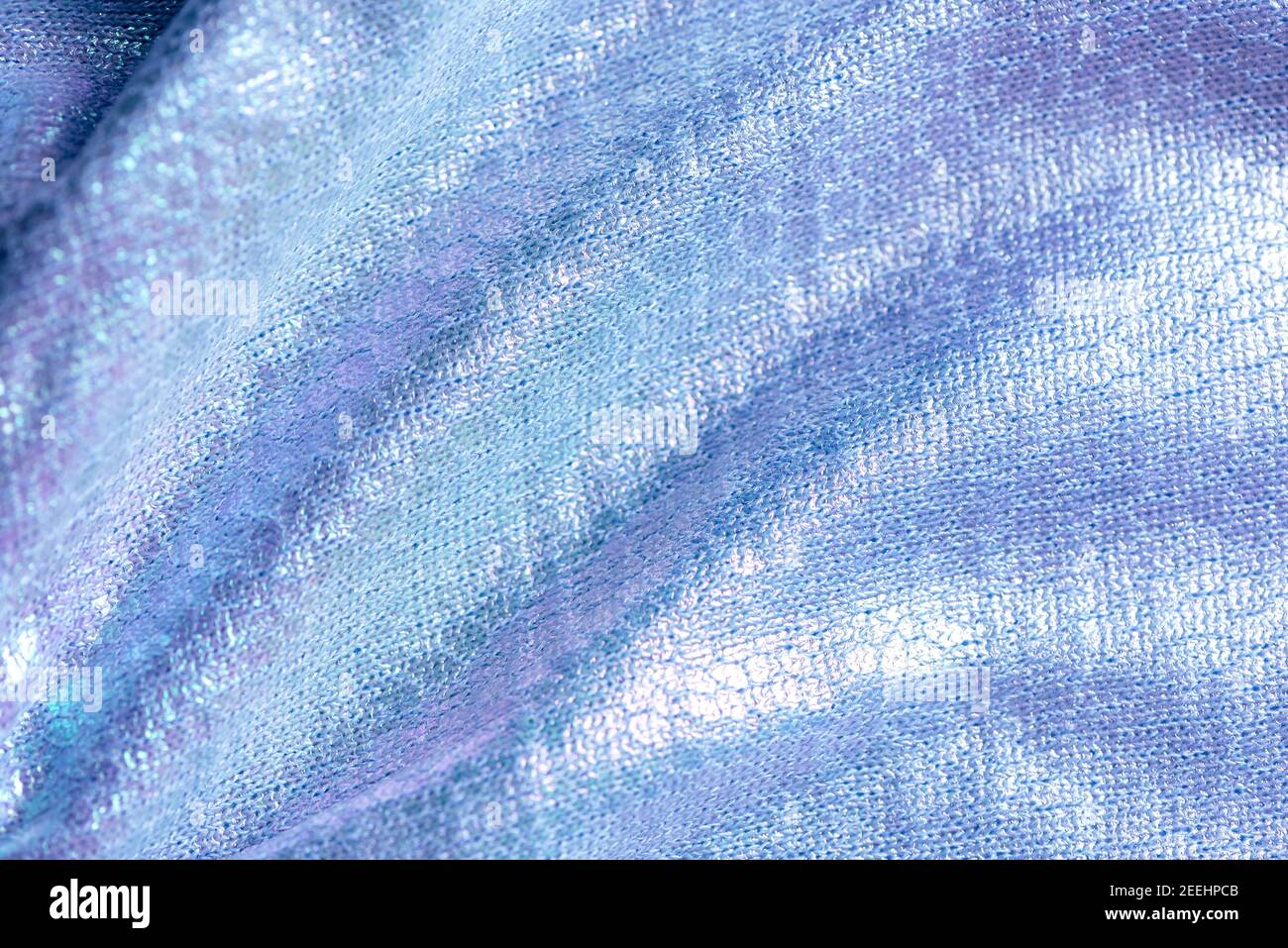 Piece of metal yarn knitted fabric texture with soft draped Stock Photo ...