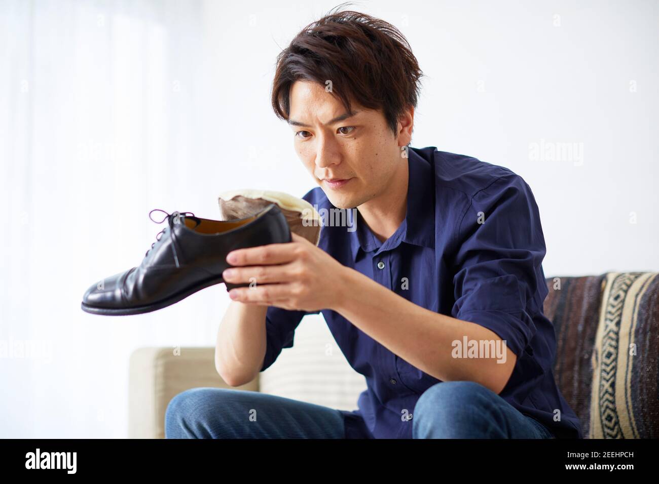 Polishing shoes home hi-res stock photography and images - Alamy