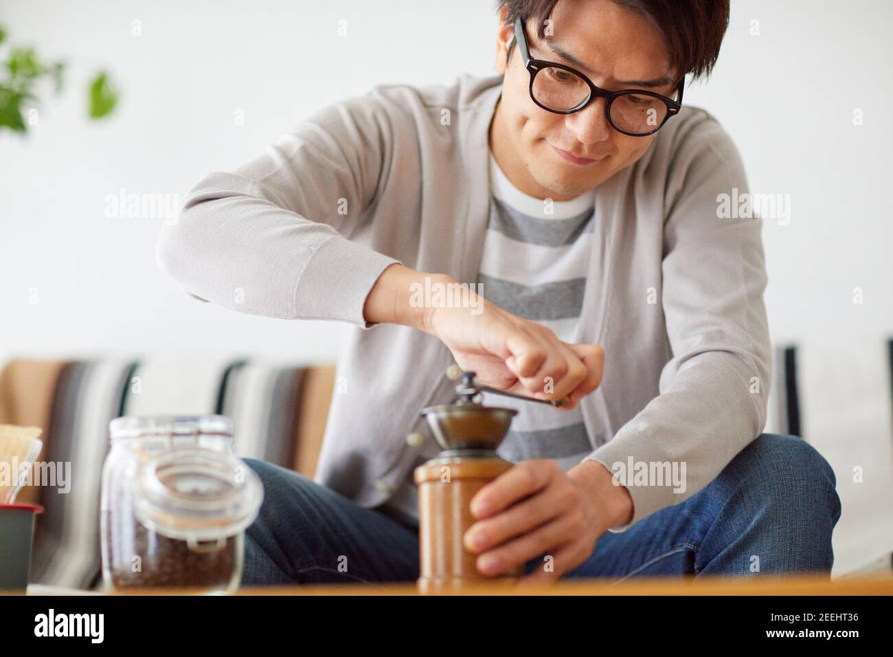 Japanese man making coffee at home Stock Photo - Alamy