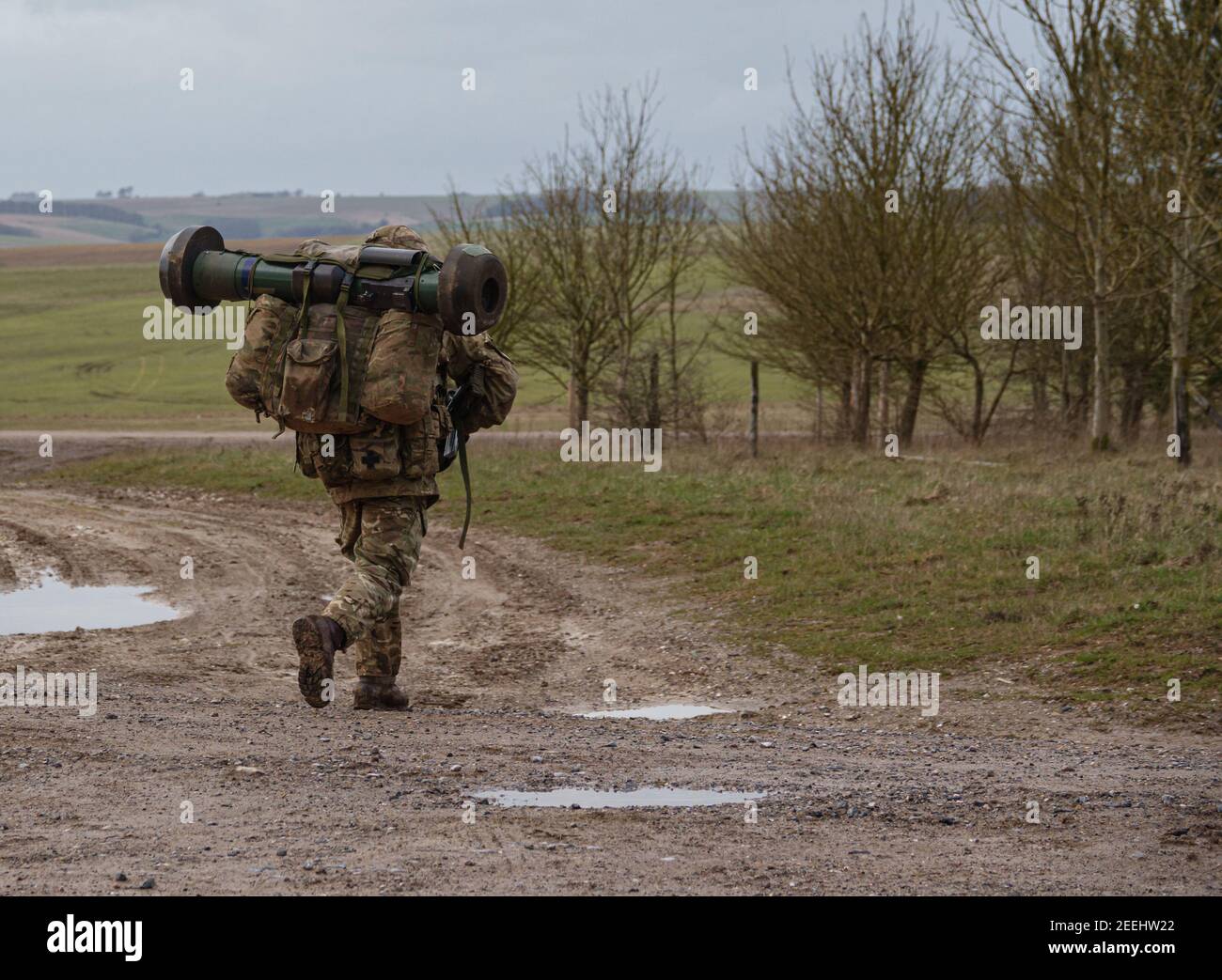 British army soldier completing an 8 mile combat fitness test tabbing ...