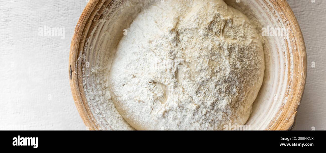The process of raising the dough in a special basket. Dough made from ...