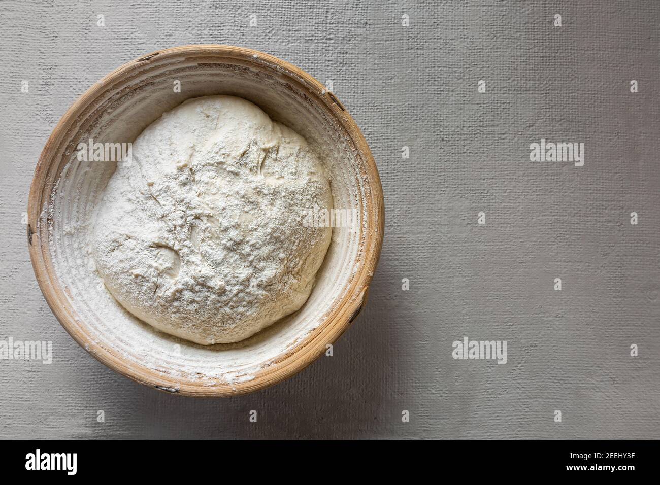 The process of raising the dough in a special basket. Dough made from ...