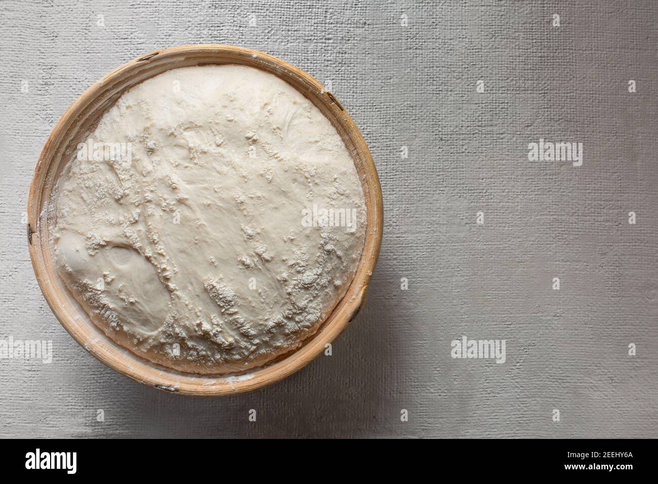 The process of raising the dough in a special basket. Dough made from ...