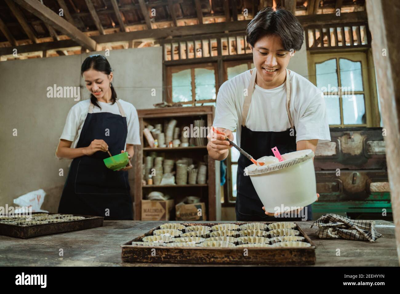 Man Wearing Apron Cooking High Resolution Stock Photography and Images ...