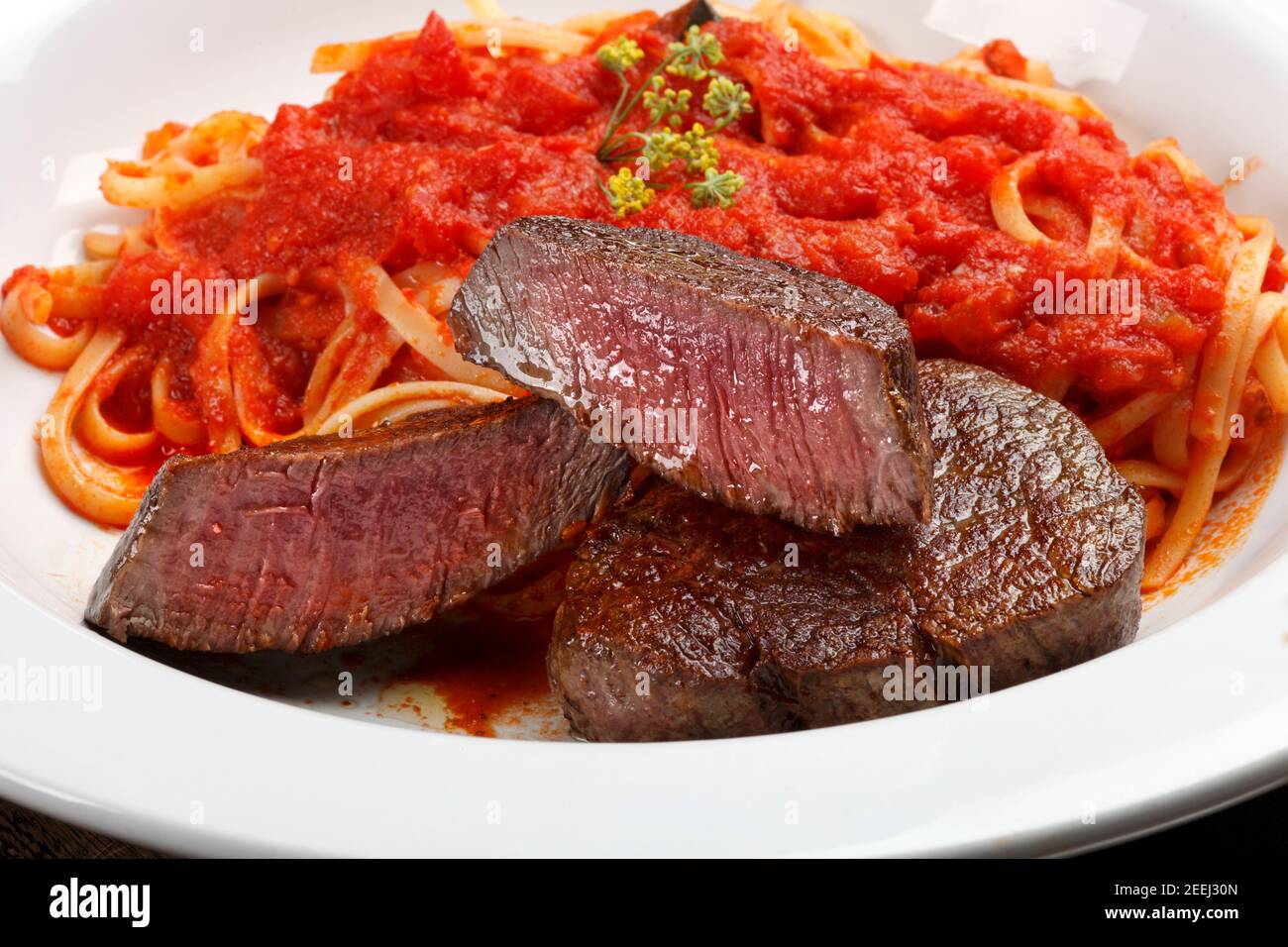 Filet mignon with pasta Stock Photo - Alamy