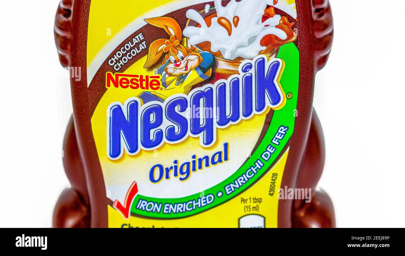 Nesquik chocolate syrup in a bunny shape bottle design. The syrup is ...