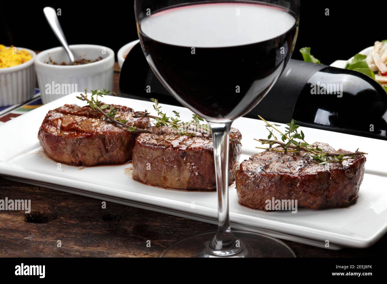 Three steaks roasted on the grill Stock Photo - Alamy
