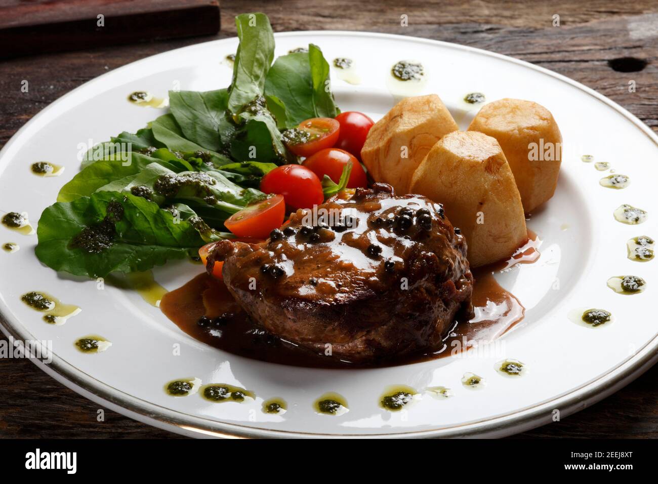 Roasted filet mignon with salad Stock Photo - Alamy
