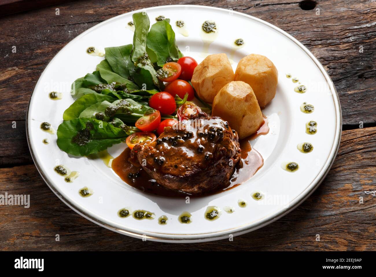 Roasted filet mignon with salad Stock Photo - Alamy