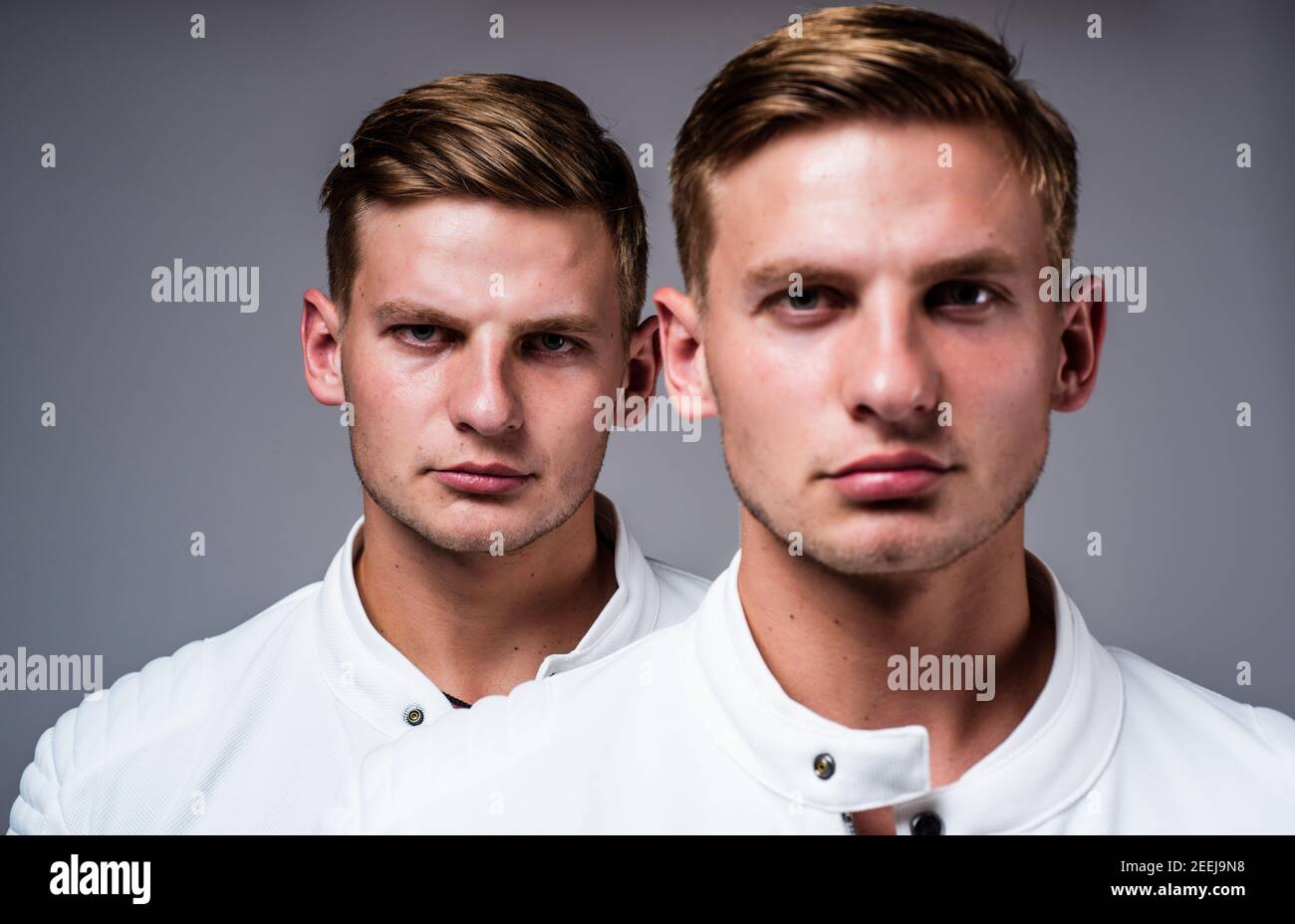 young twin brothers with similar appearance, twins Stock Photo - Alamy