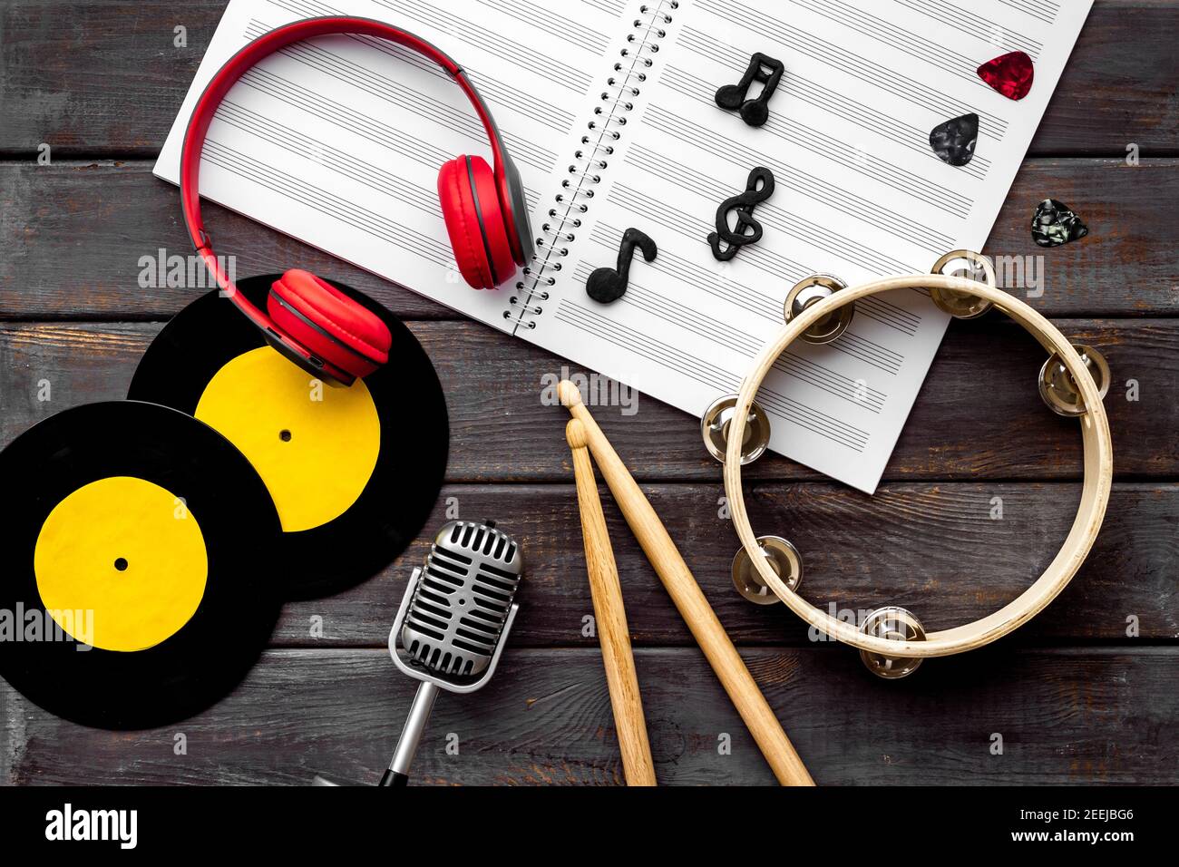 Flat lay of music background - instrument with sheet music, top view ...