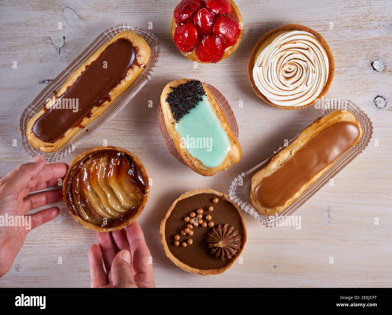 Pastry chef arranging delicious desserts hi-res stock photography and ...