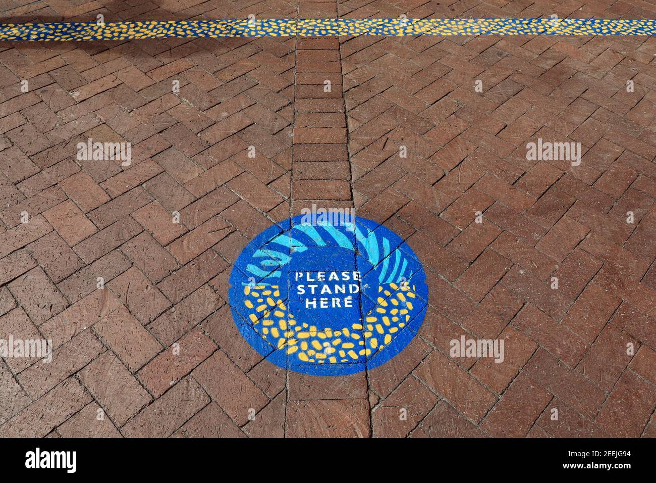 Social distancing marker on ground at V&A Waterfront, Cape Town, South ...