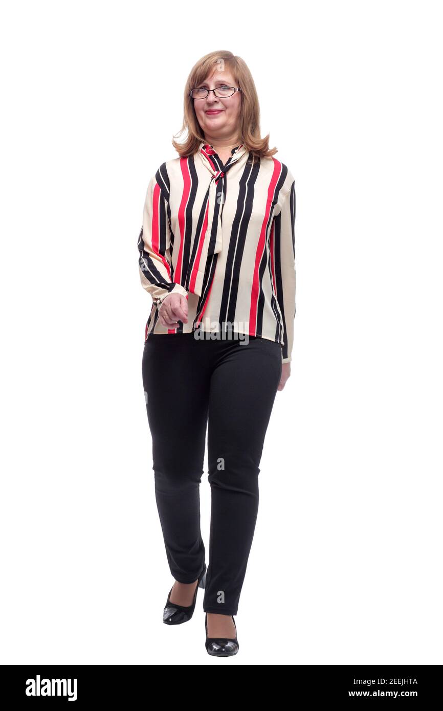 in full growth. smiling modern woman striding forward Stock Photo - Alamy