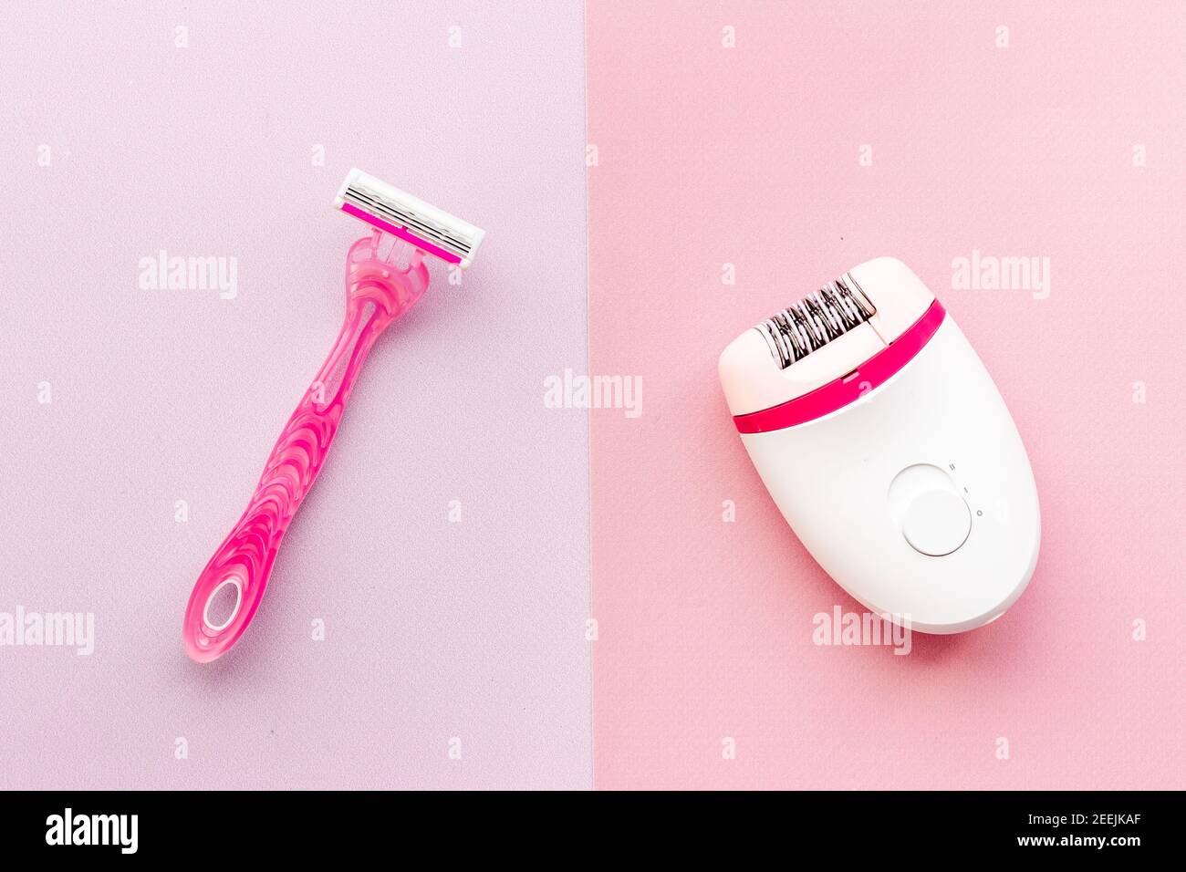 White epilator with pink razor. Epilation concept, removal of unwanted ...