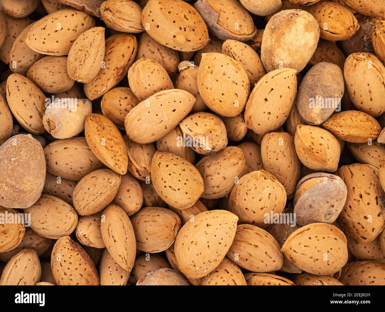 Organic almonds as background, top view. Healthy snack, indispensable ...