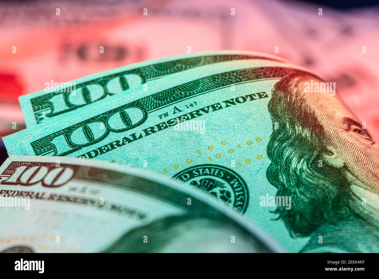 money background from dollars in neon light, close up Stock Photo - Alamy
