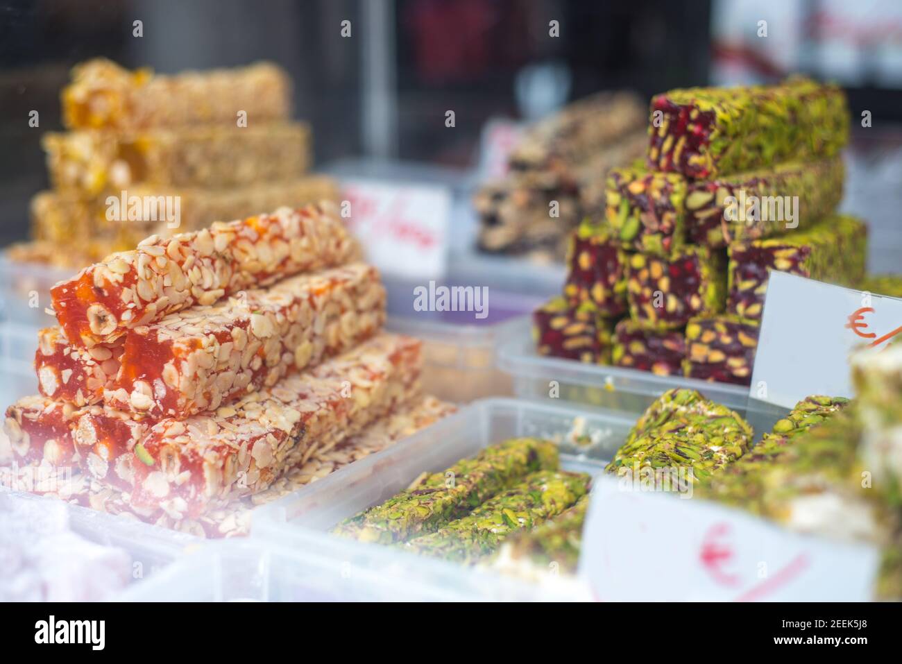 Beautiful colorfully coated bars and cubes of candy and Turkish delight ...