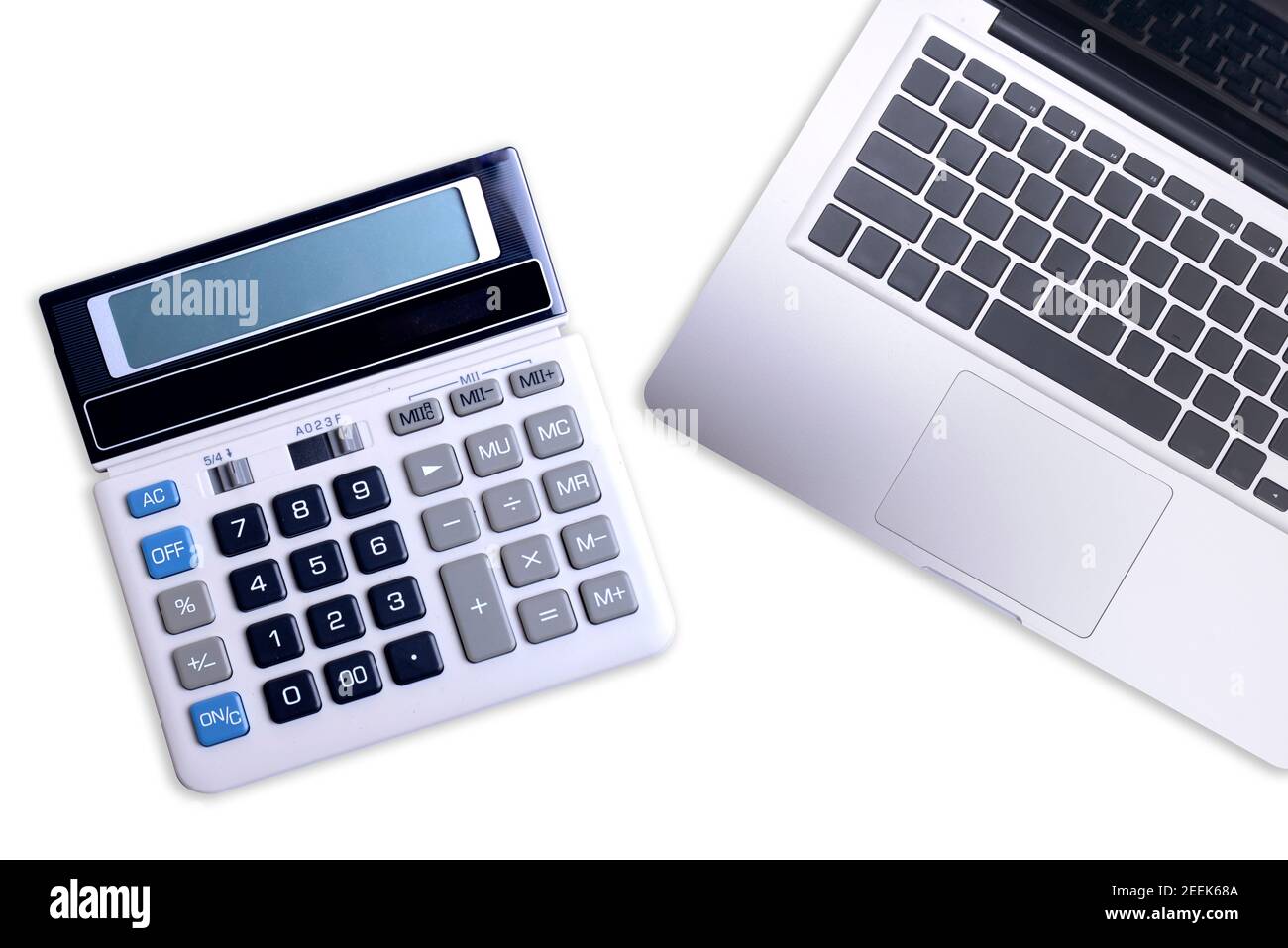 Calculator and laptop isolated over white background Stock Photo - Alamy