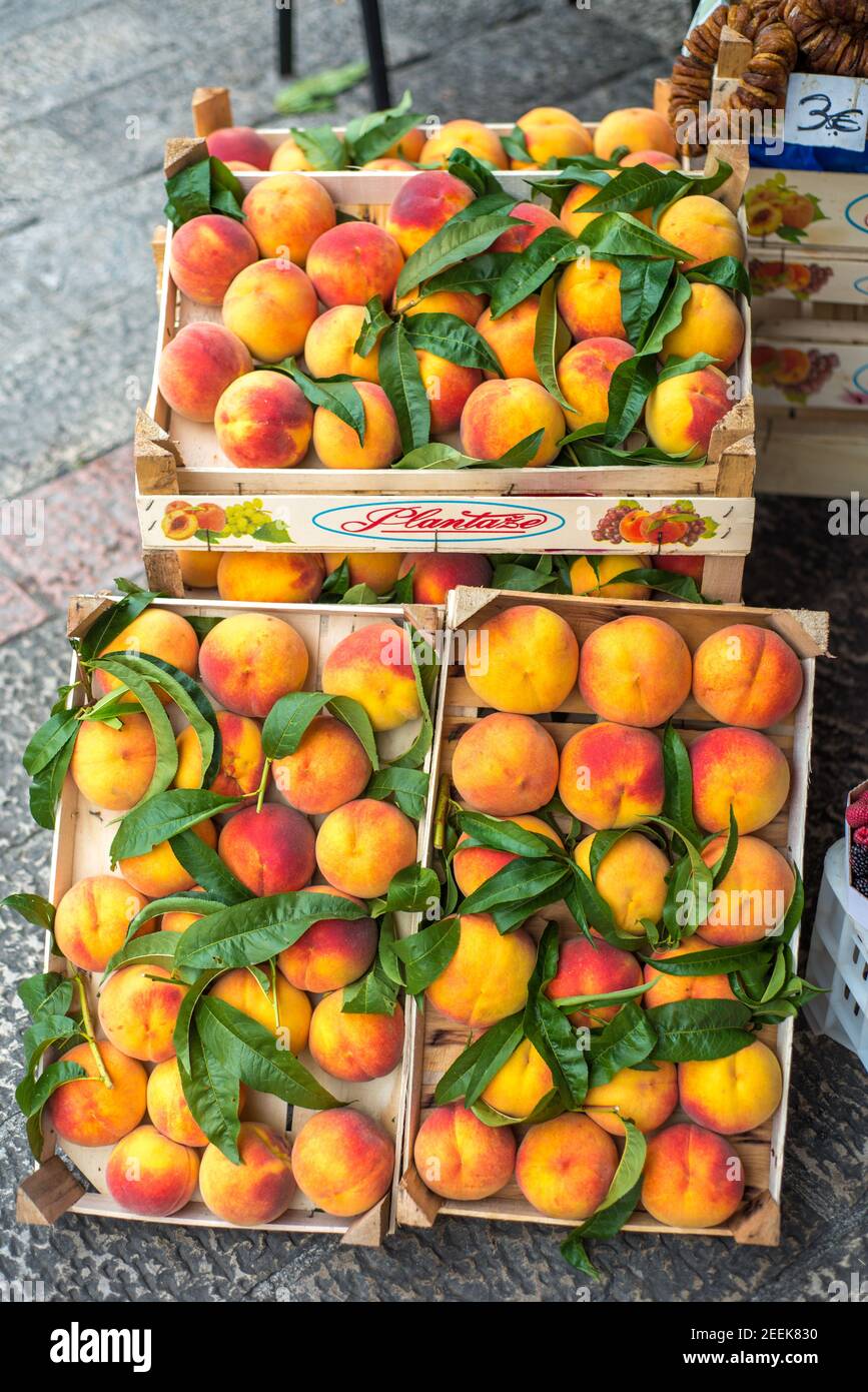 Fresh peaches,regionally grown and displayed in boxes at Kotor farmers ...