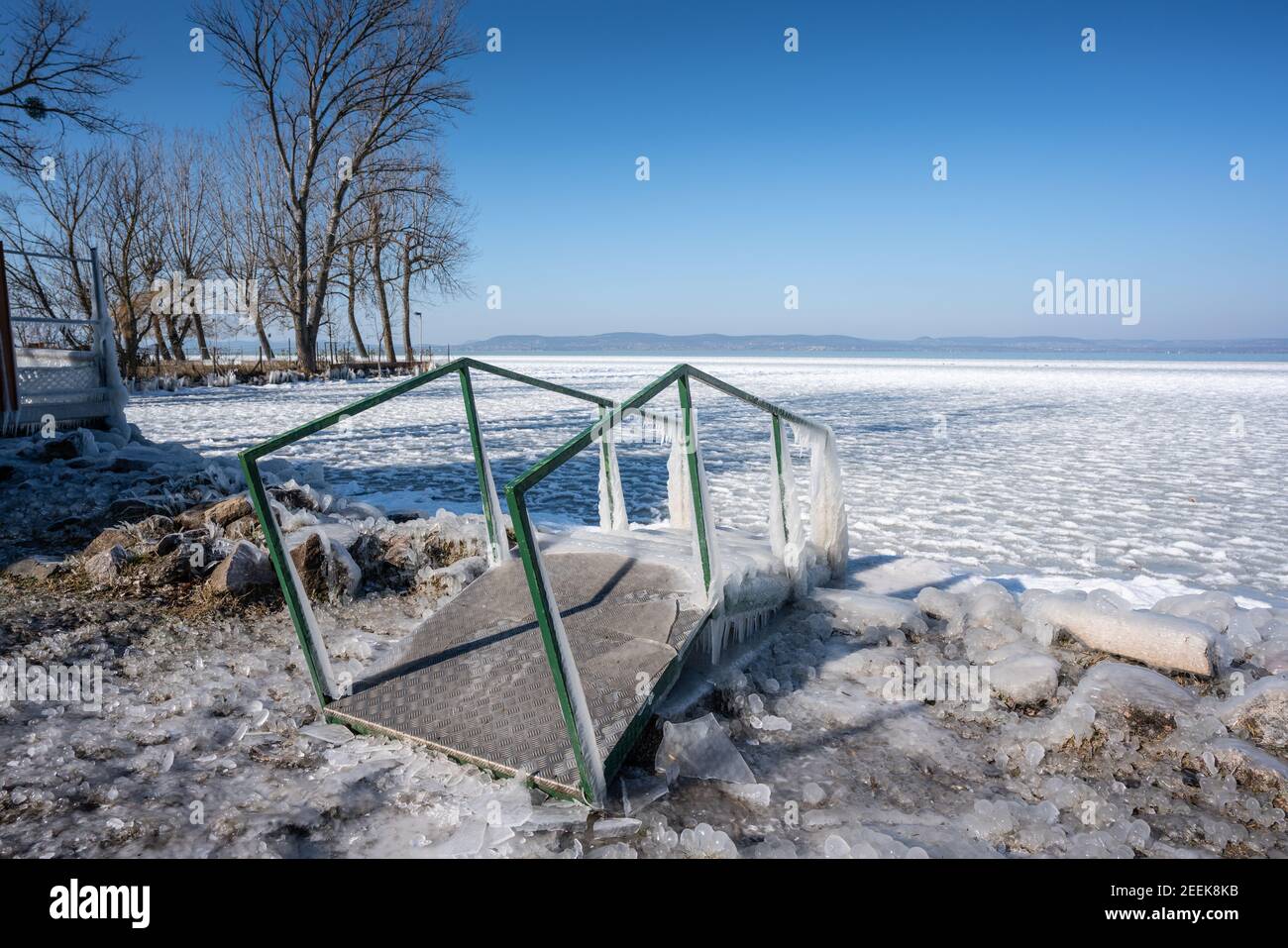Beautiful frozen Lake Balaton with steel steps Stock Photo - Alamy
