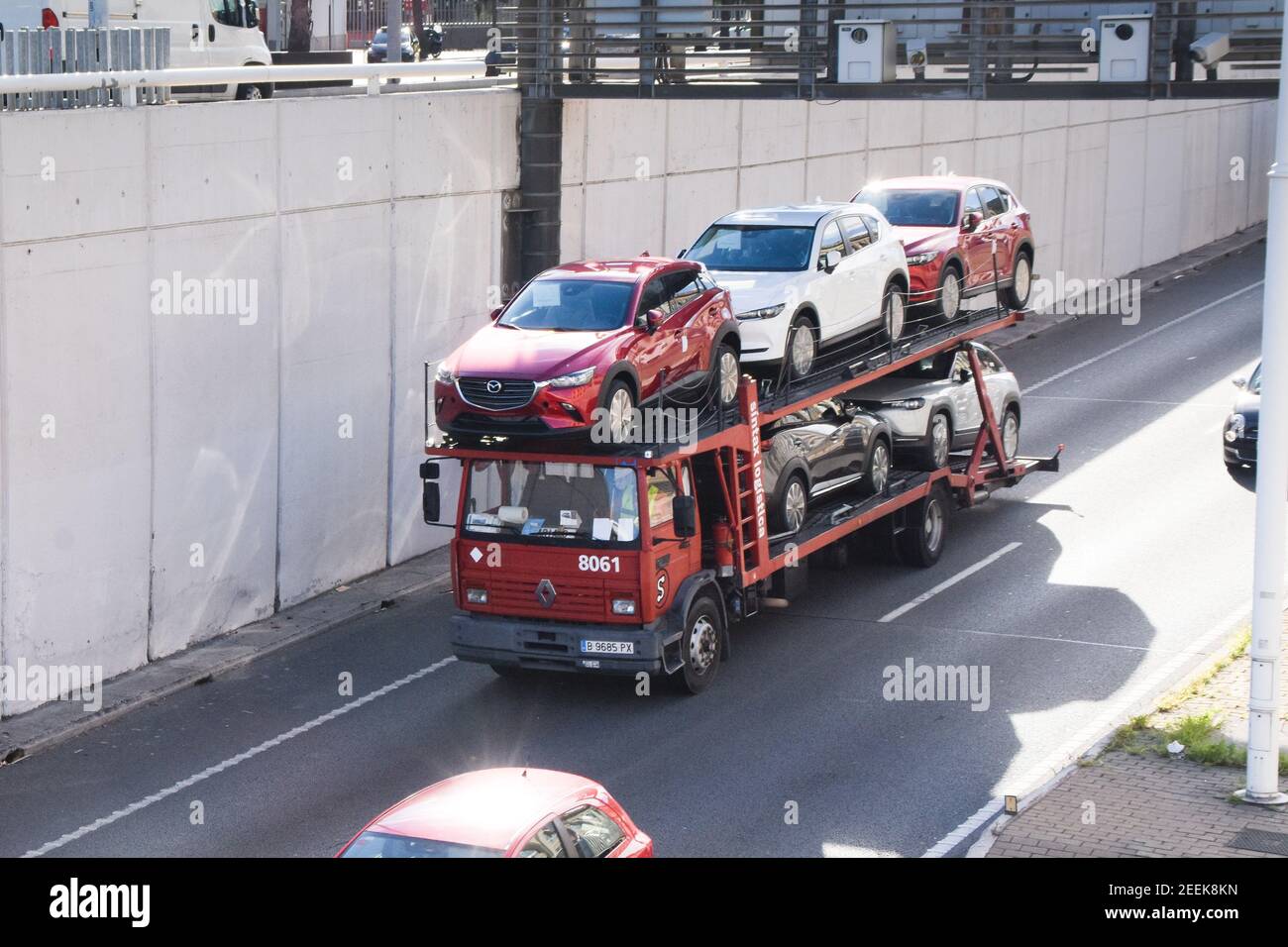 Truck carrying cars Stock Photo - Alamy