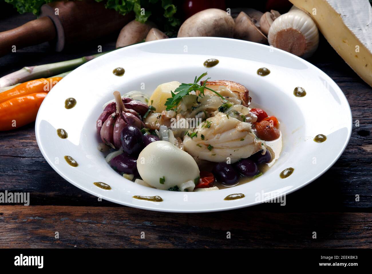 Baked cod with olive oil Stock Photo - Alamy