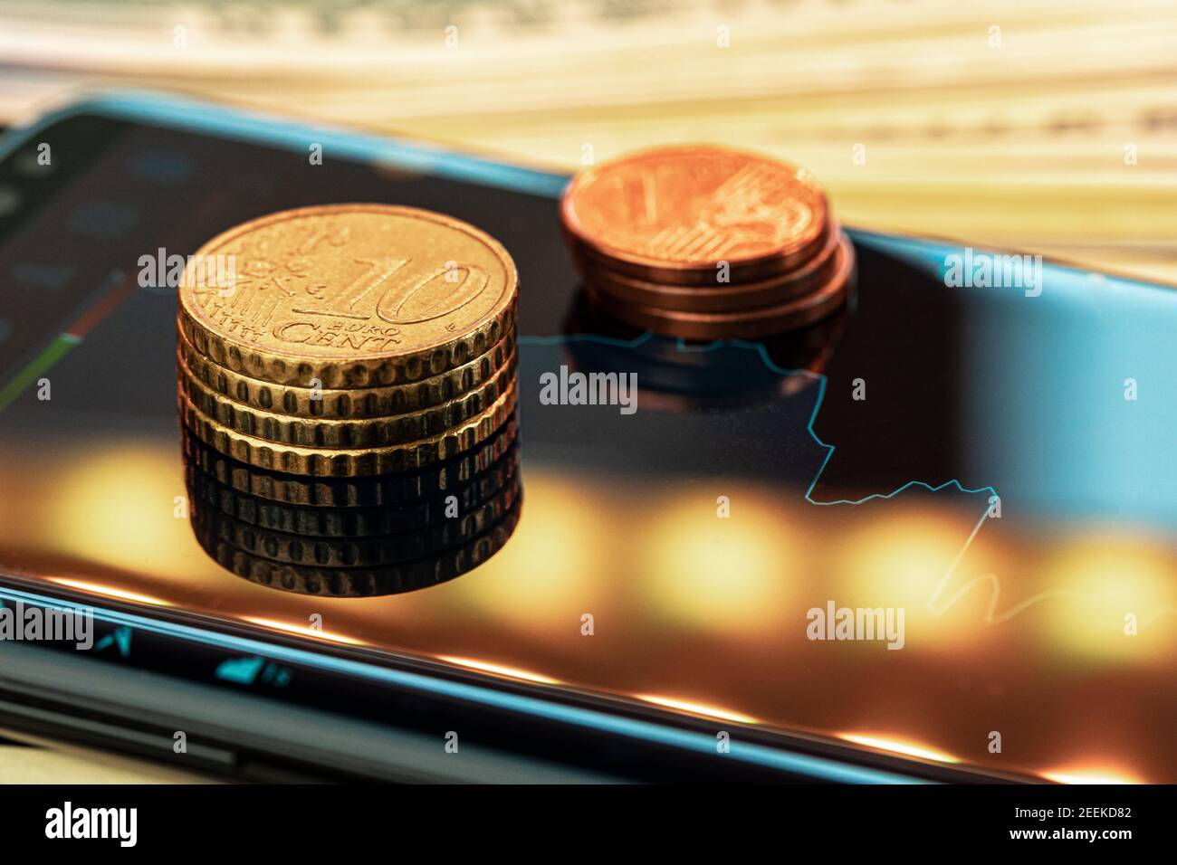 Euro coin on stock chart. Financial investment concept Stock Photo - Alamy