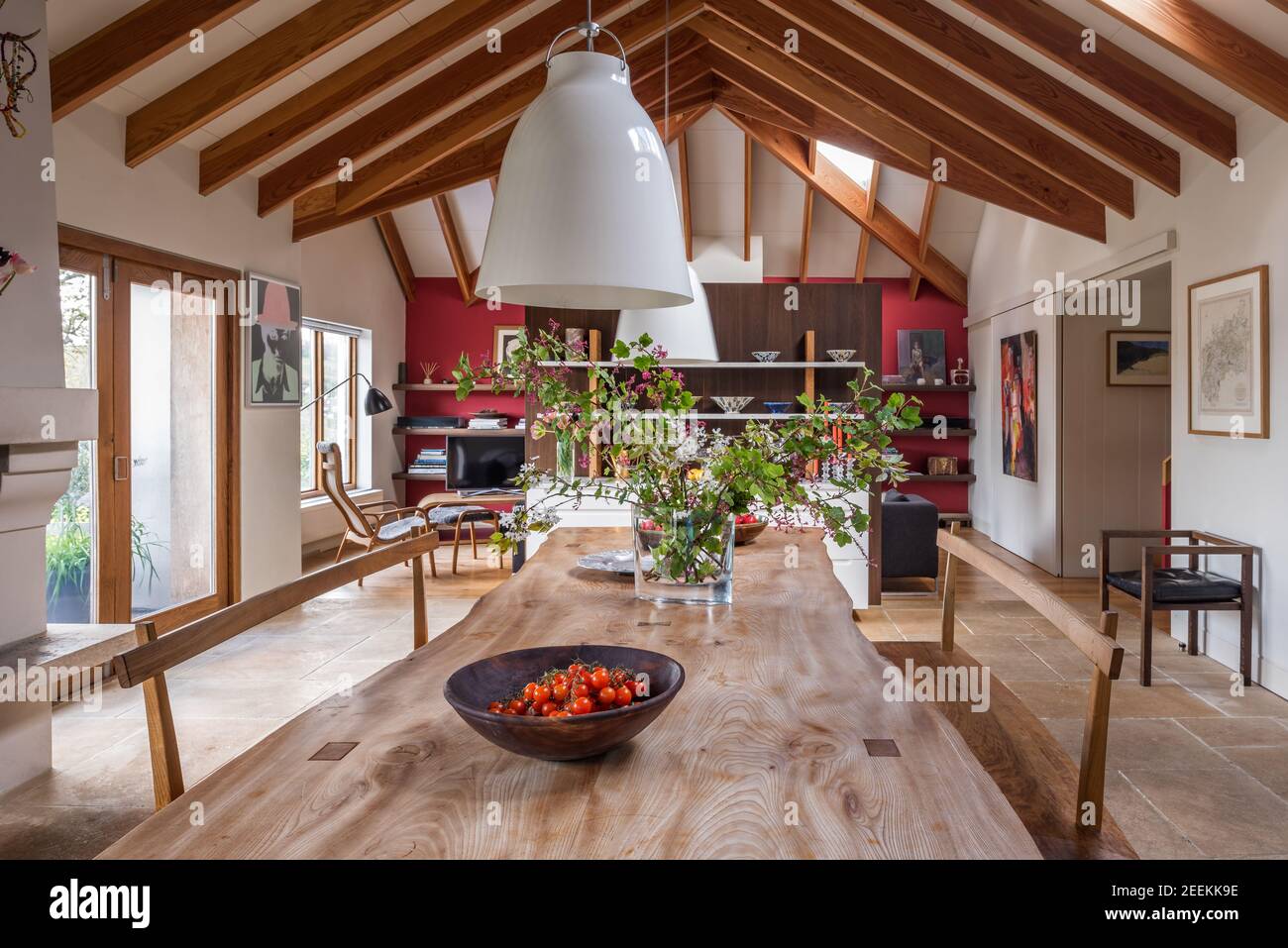 Fritz Hansen Caravaggio pendant shades above Dominic Ash table Stock ...