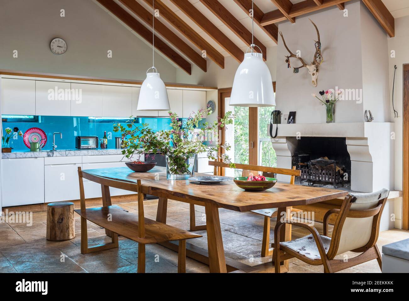 Fritz Hansen Caravaggio pendants above Dominic Ash table in galley ...