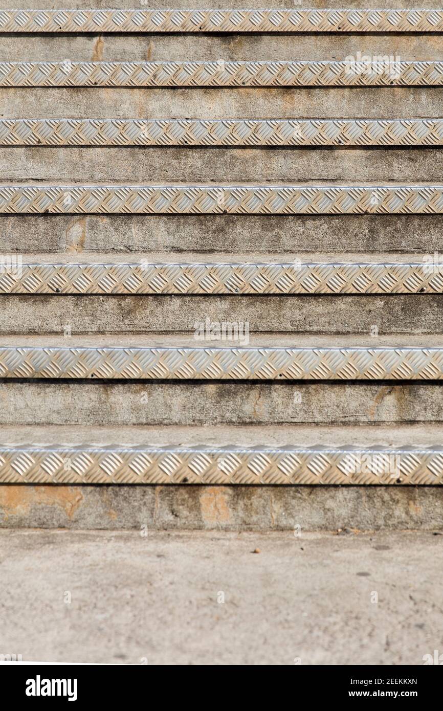 Closeup of stairs with textured metal edge Stock Photo - Alamy
